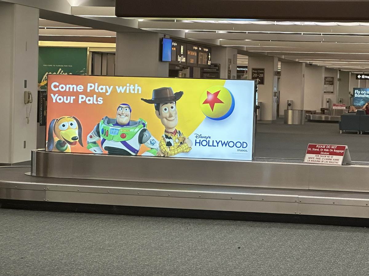 Photos: Updated Walt Disney World Advertisements at MCO Magic of Disney ...