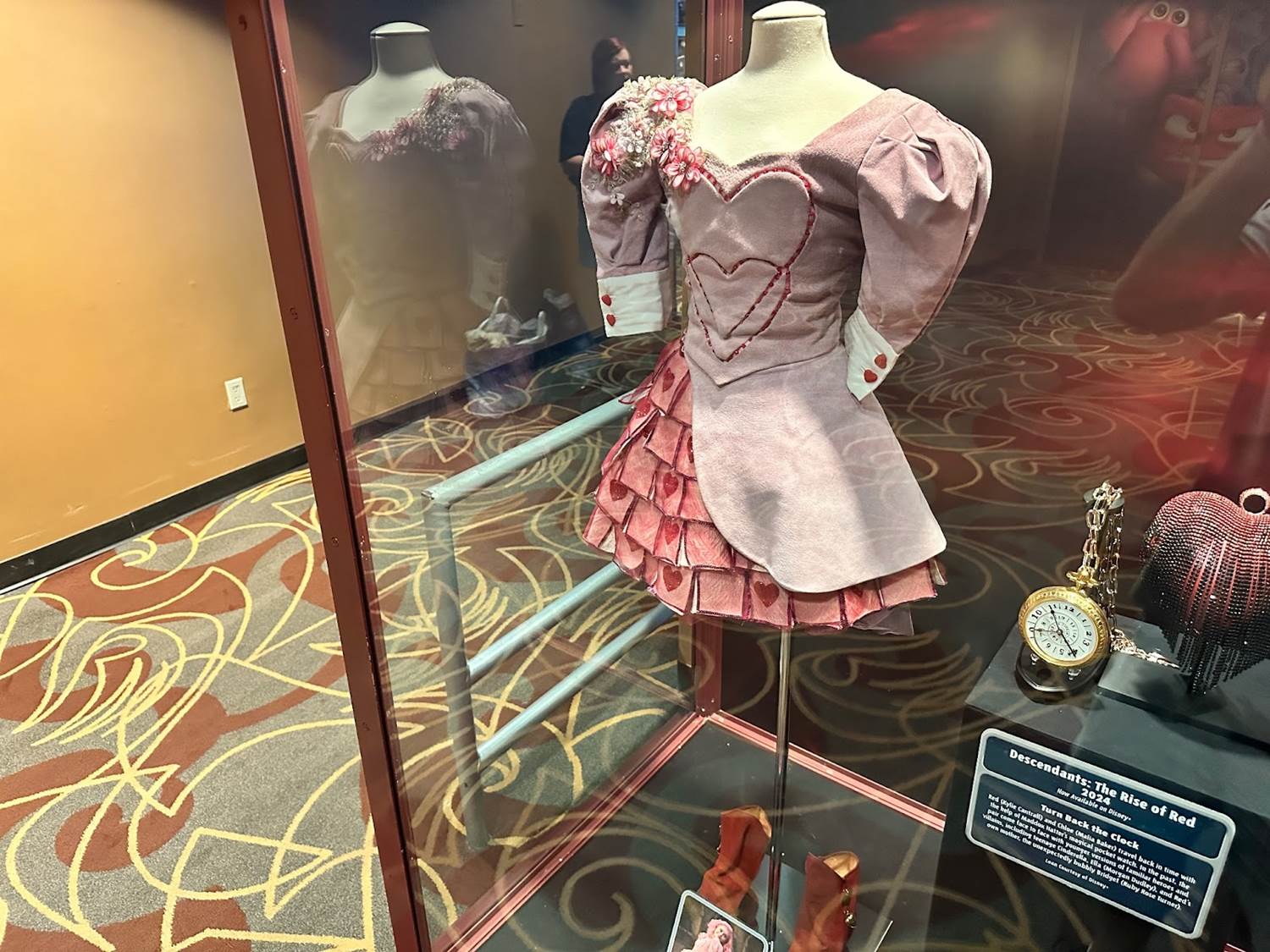 Photos – “Descendants: The Rise of Red” Costumes Now on Display at Walt ...