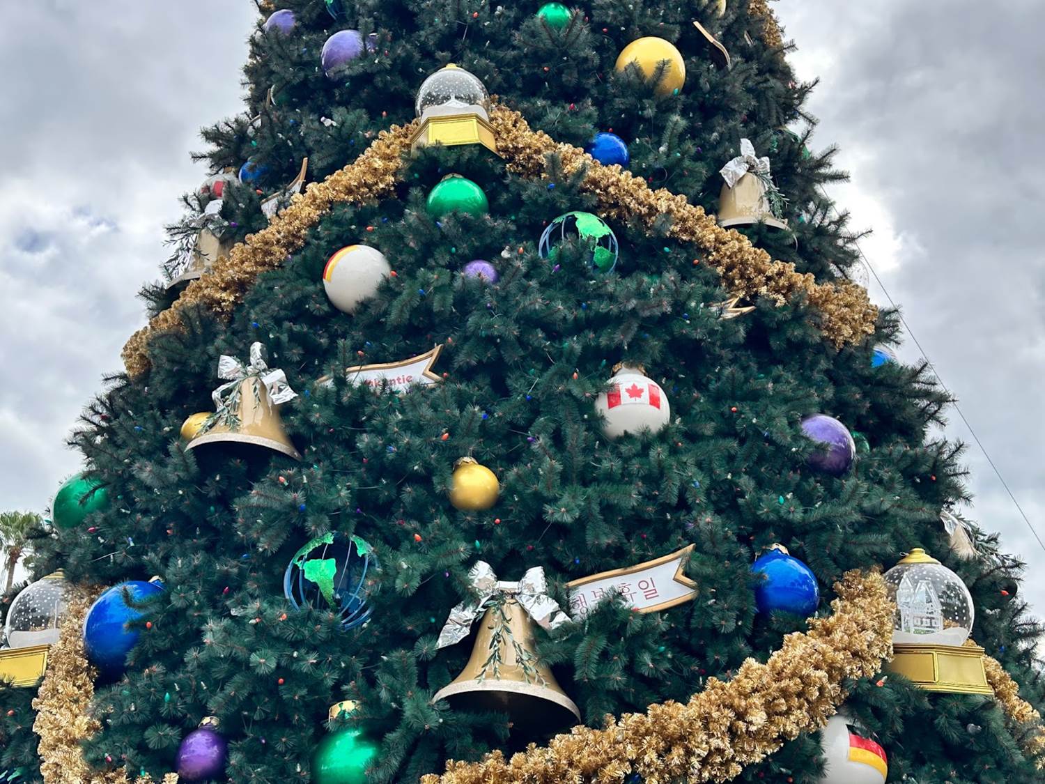 EPCOT Christmas Decorations and the Gold Musical Rotating Tin Popcorn ...