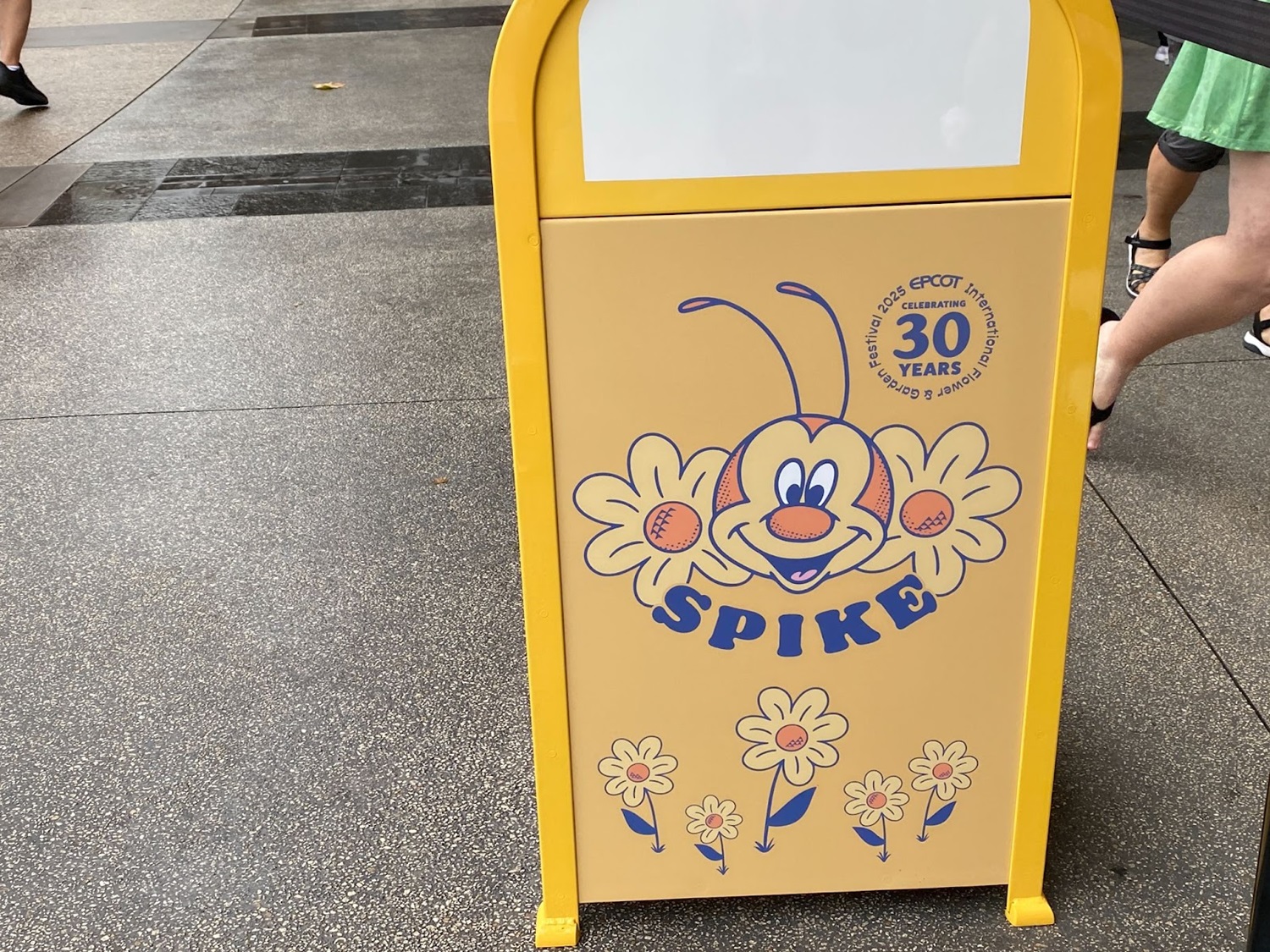 Photos: Orange Bird and Spike the Bee Trash Cans On Display for the EPCOT International Flower ...